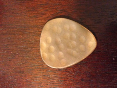 Acoustic Guitar Picks: 9 Different Guitar Pick Materials Compared